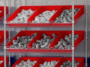 Regency 18" x 36" Stationary Slanted Chrome Shelf Unit with 15 Red Bins