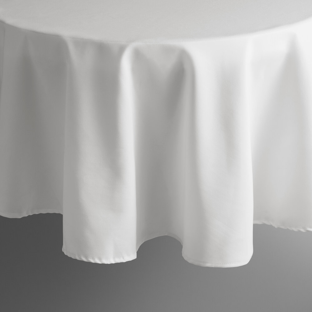 Intedge 64" Round Ivory 100% Polyester Hemmed Cloth Table Cover