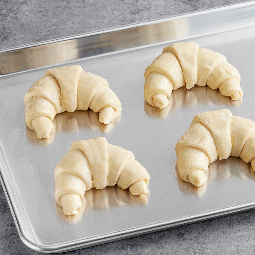 Schulstad Ready to Bake Large Curved Butter Croissant 3.2 oz. - 54/Case