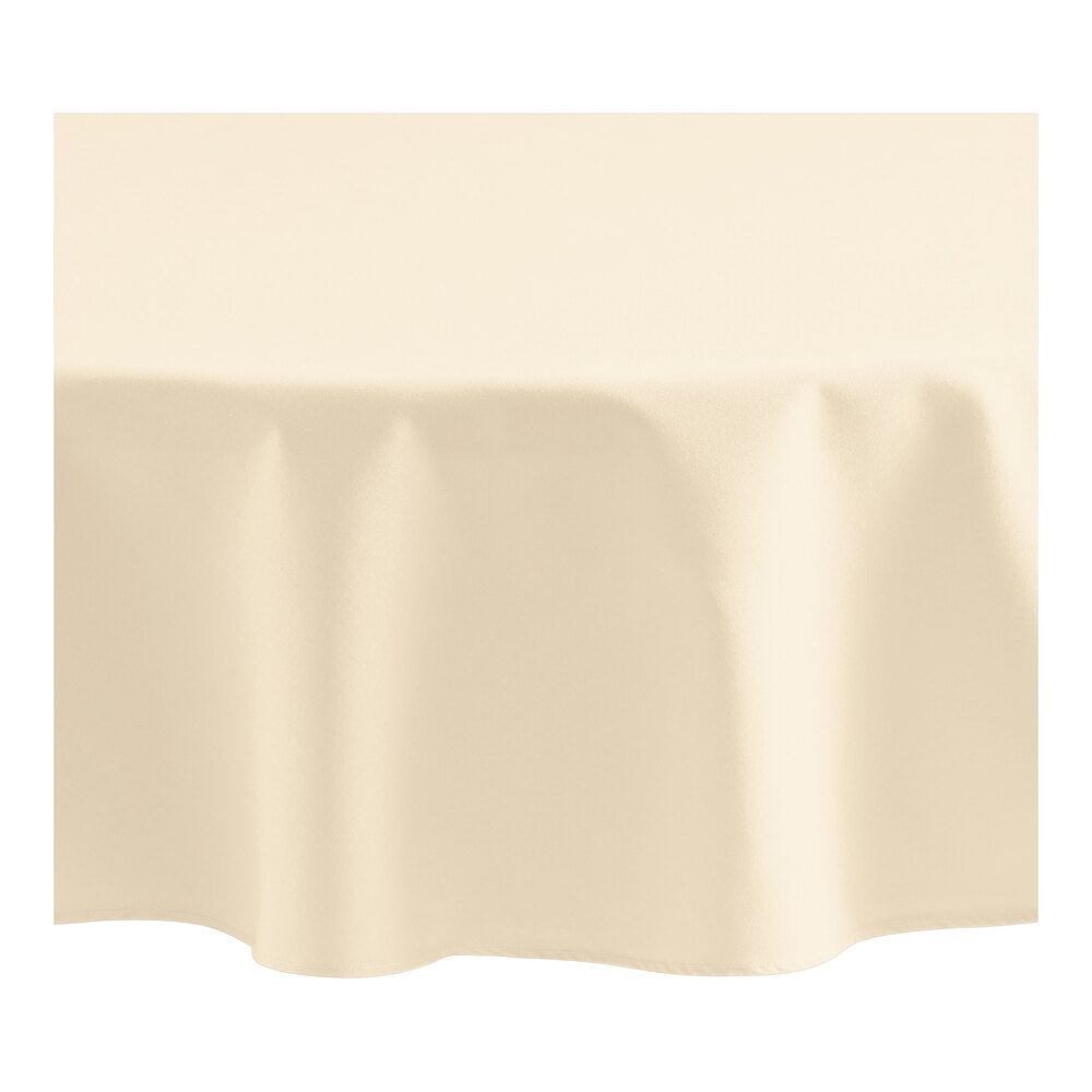 Oxford 132" Round Ivory 100% Spun Polyester Hemmed Edge Cloth Table ...