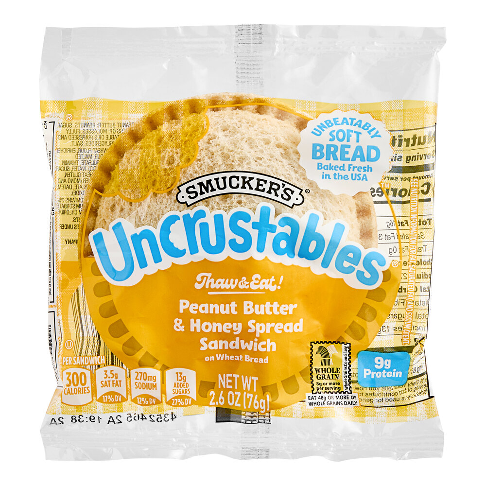 Smucker's Uncrustables Honey and Peanut Butter Whole Wheat Sandwich 2.6 ...