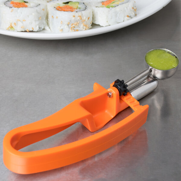 Vollrath 47404 33 oz. Squeeze Disher Portion Scoop - Orange #100