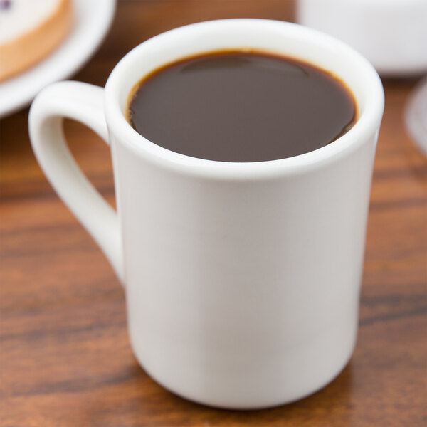 Tuxton TRE-017 Reno / Nevada 8 oz. Eggshell China Tiara Mug - 36/Case