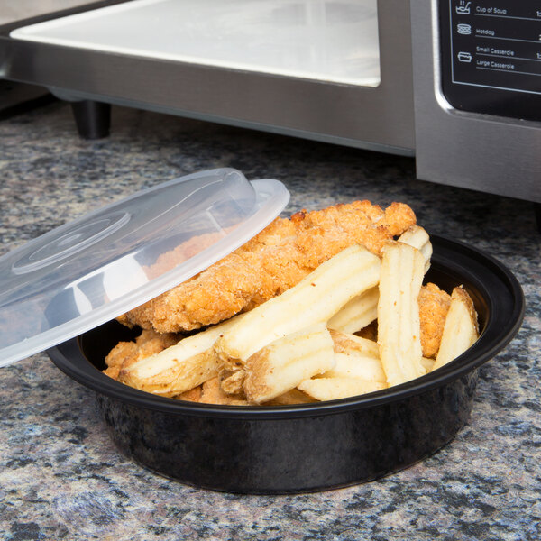 Pactiv Newspring NC723B 24 oz. Black 7" VERSAtainer Round Microwavable ...