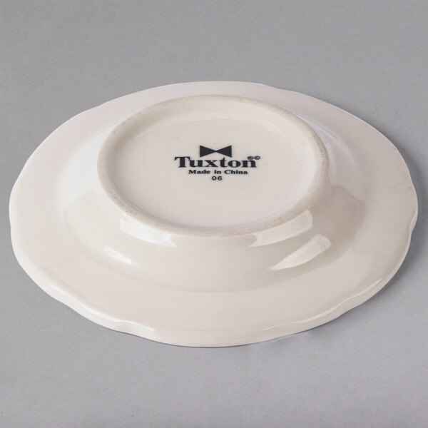 Tuxton TSC-005 Shell 5 1/2" Eggshell Scalloped Edge China Plate - 36/Case
