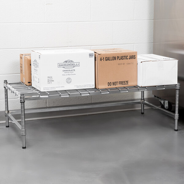 Regency 24" x 48" Heavy-Duty Chrome Dunnage Rack with Mat