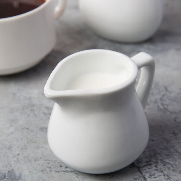 Acopa 3.5 oz. Bright White Porcelain Creamer - 48/Case