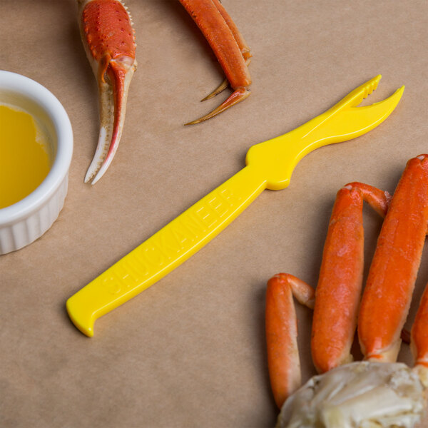 Choice Shuckaneer 7 1/2" Yellow Seafood Sheller - 12/Pack