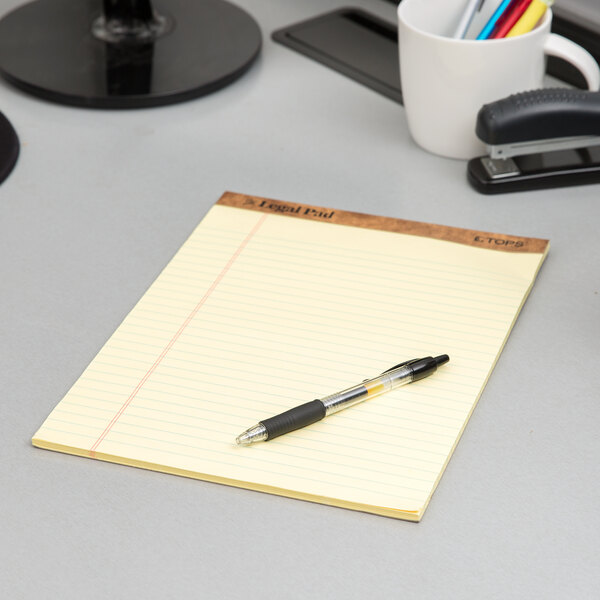 TOPS 7532 8 1/2" x 11 3/4" Wide Ruled Canary Perforated Legal Pad - 12/Pack