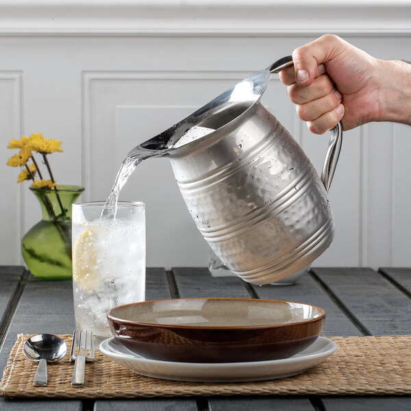 Acopa 64 oz. Hammered Stainless Steel Bell Pitcher with Ice Guard