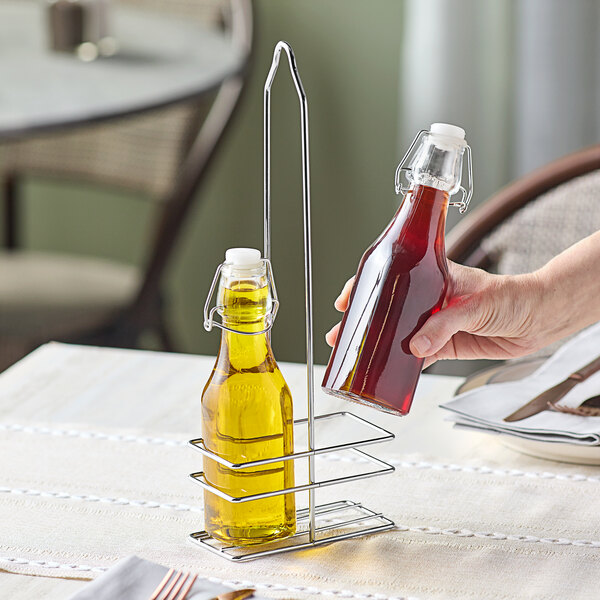 Choice 8.5 oz. 3-Piece Oil & Vinegar Swing Top Lid Cruet Set with Rack