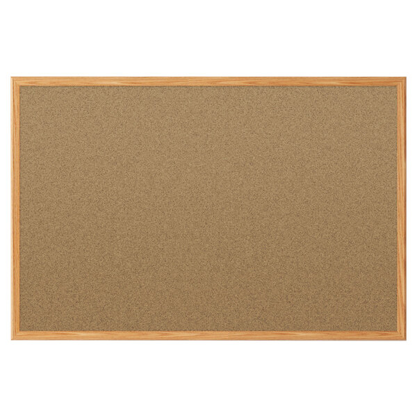 Mead 85367 48" x 36" Brown Cork Bulletin Board with Oak Frame