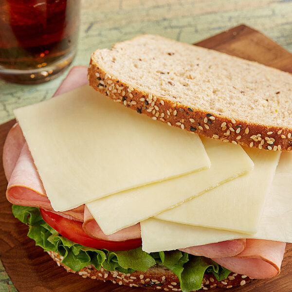 Dinner Bell Creamery 5 lb. White Mild Cheddar Cheese - 2/Case