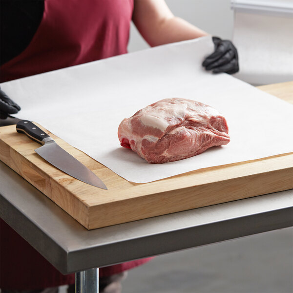Choice 24" x 700' 40 lb. Premium White True Butcher Paper Roll