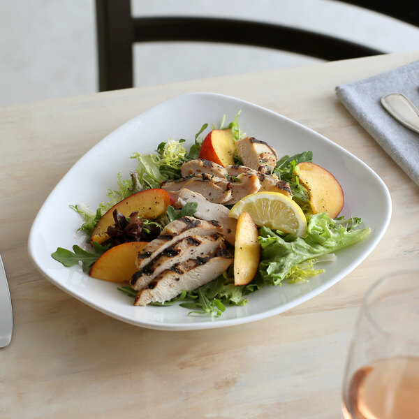 Sample - Acopa Nova 10 1/2" x 9 1/4" Cream White Asymmetric Stoneware Plate