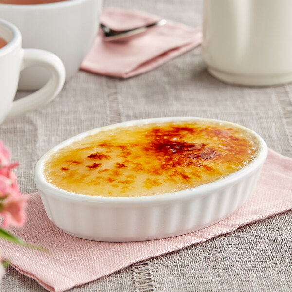 Tuxton BPK-0502 5 oz. Porcelain White Fluted Oval China Creme Brulee ...