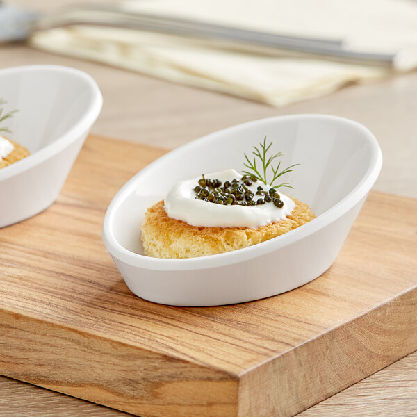 Tablecraft 10313W 0.75 oz. Oval White Mini Melamine Bowl