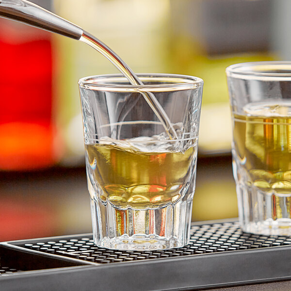 Acopa 2 oz. Fluted Shot Glass with 1 oz. Pour Line - 12/Pack