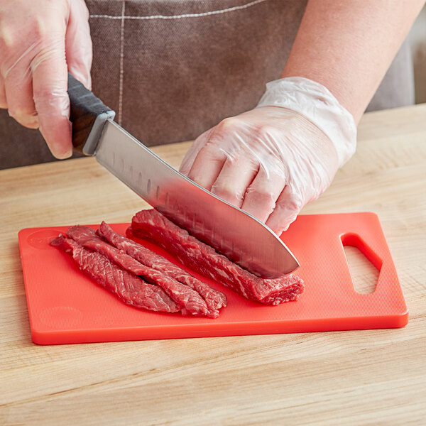 Choice 10" x 6" x 1/2" Red Polyethylene Cutting Board