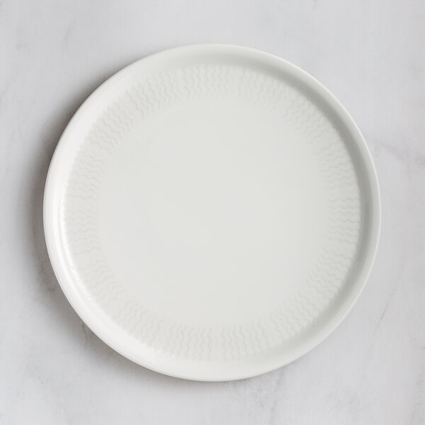 RAK Porcelain Leon 12" Ivory Embossed Porcelain Pizza Plate - 6/Case