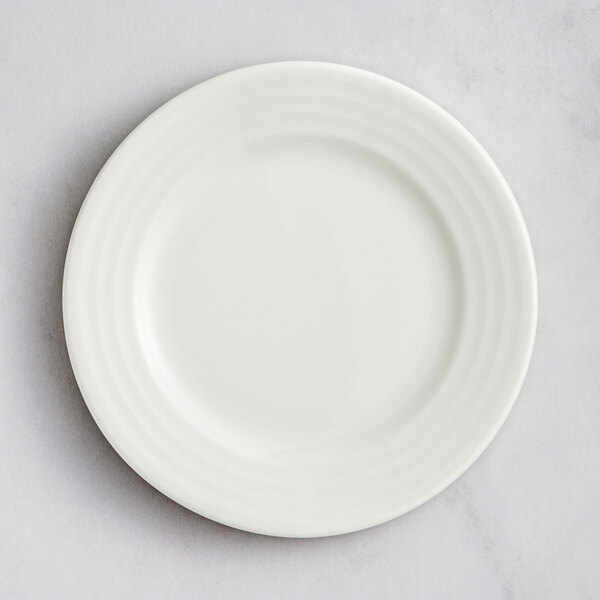 RAK Porcelain Rondo 5 7/8" Ivory Embossed Wide Rim Porcelain Flat Plate ...