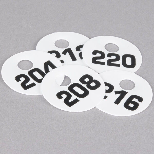 Cal-Mil 869-2 Round Plastic Coat Check Tag Set - 201-300