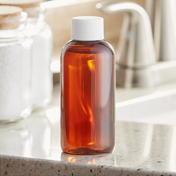 4 oz. PET Amber Boston Round Bottle with 24/410 White Continuous Thread ...