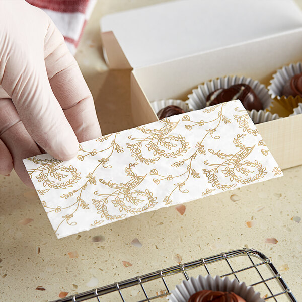 5 3/8" x 2 5/8" 3-Ply Glassine 1/2 lb. White Candy Box Pad with Gold ...