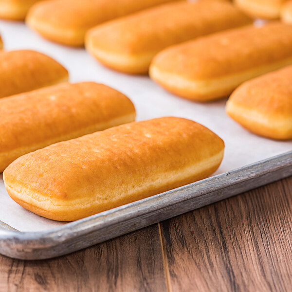 Rich's 2.25 oz. Ready-to-Finish Unfilled Long John Yeast Donut - 60/Case