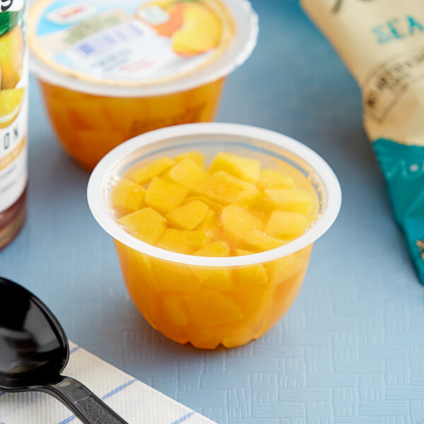Dole Diced Peaches in Juice 4 oz. Cup - 36/Case