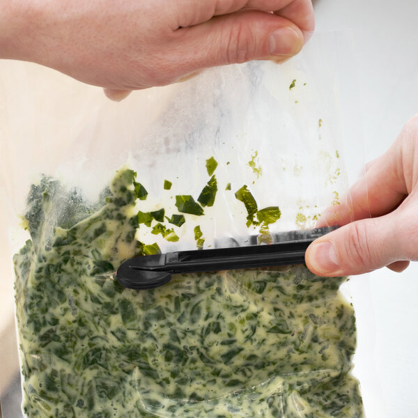 Tangibles Pouchmate Black Plastic Magnetic Food Pouch Cutter / Squeezer