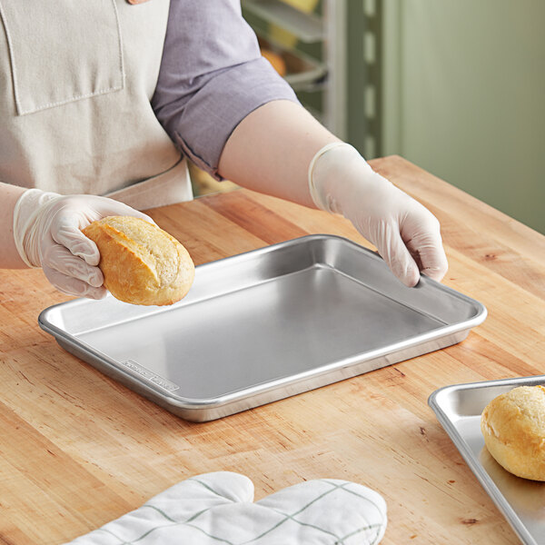 Nordic Ware Naturals 9 5/8" x 13" Quarter Size 20 Gauge Wire in Rim Aluminum Bun / Sheet Pan 45300