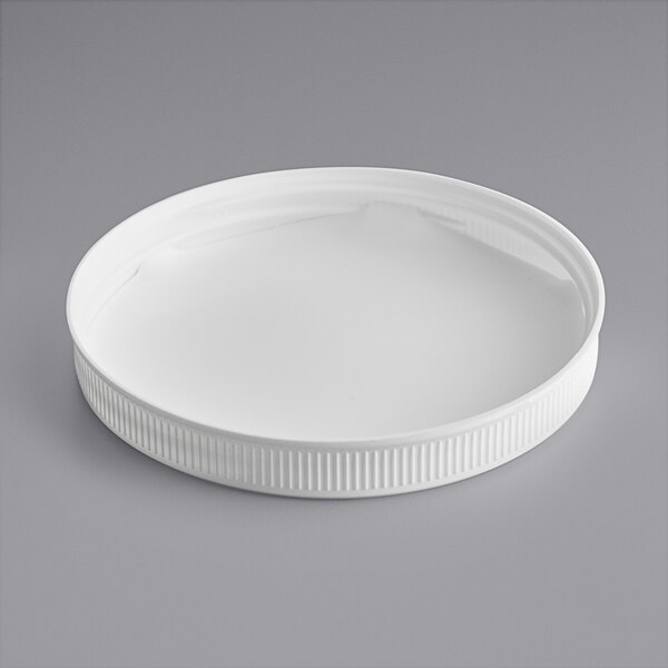 110/400 White Ribbed Plastic Cap with Foam Liner - 100/Pack