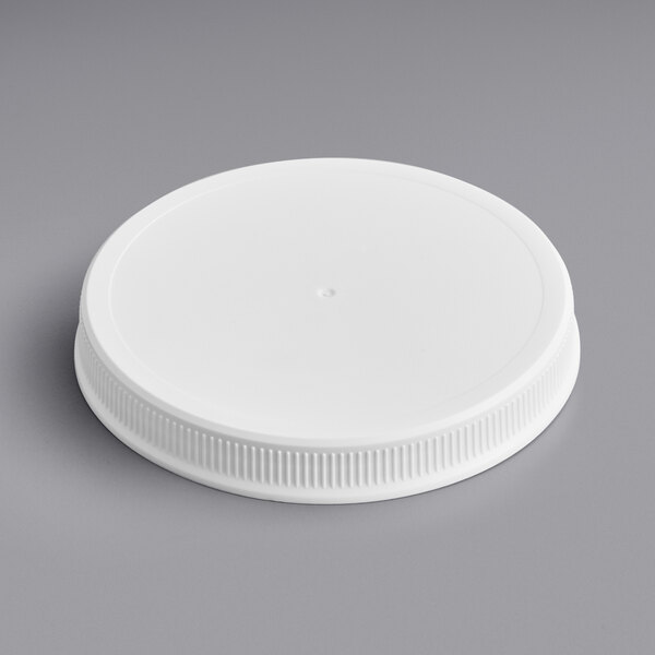 110/400 Unlined White Ribbed Plastic Cap - 100/Pack
