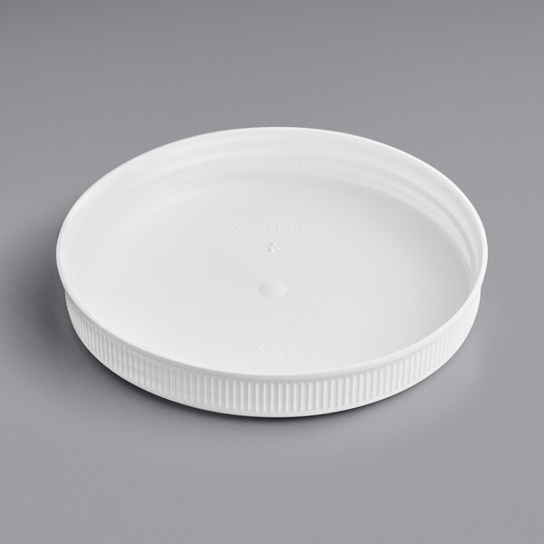 110/400 Unlined White Ribbed Plastic Cap - 100/Pack