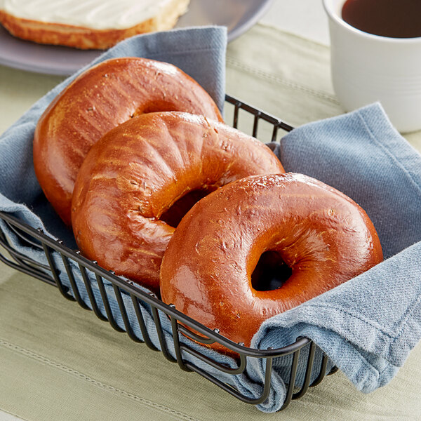 Just Bagels Frozen Authentic New York Pumpernickel Bagel 4 oz. - 48/Case