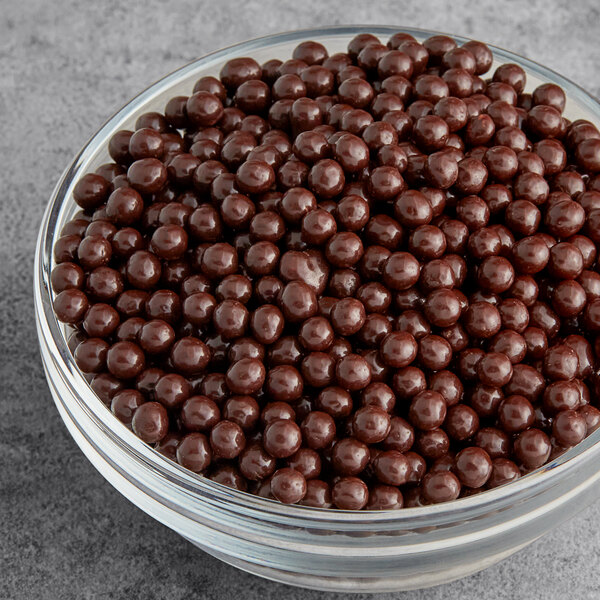 Valrhona 55% Dark Chocolate Crunchy Pearls 6.6 lb. - 3/Case