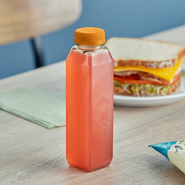 12 oz. Tall Square rPET Clear Juice Bottle with Orange Lid - 228/Case
