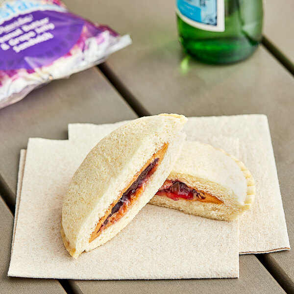 Smucker's Uncrustables Grape Jelly and Peanut Butter Sandwich 2 oz ...