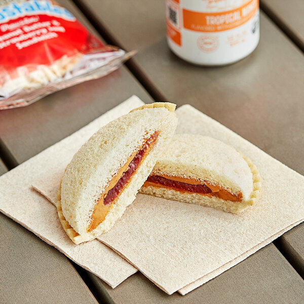 Smucker's Uncrustables Strawberry Jam and Peanut Butter Sandwich 2 oz ...