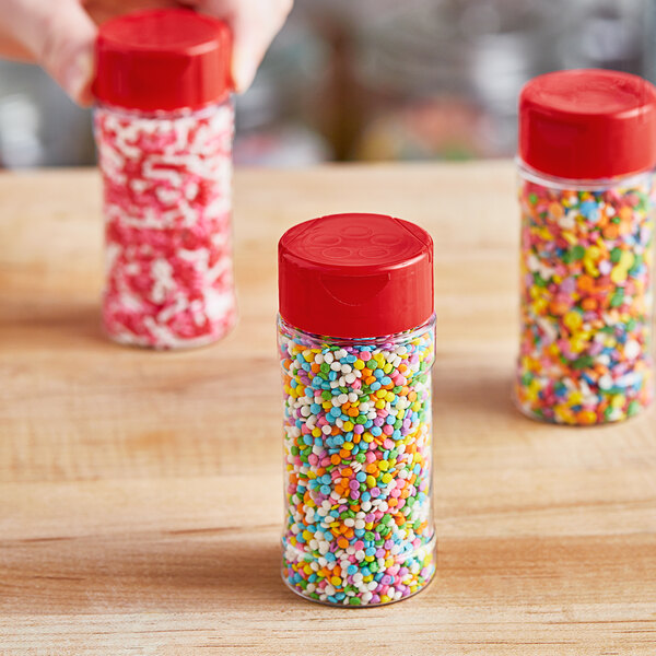 4 oz. Round Plastic Spice Container and 43/485 Red Induction-Lined Flip ...