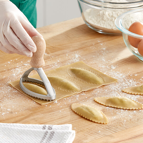 Imperia Tagliaravioli 4 1/2" x 2 1/8" Oval Ravioli Cutter Stamp 7809