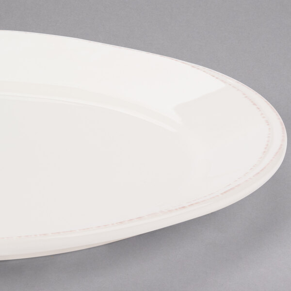 Libbey Farmhouse 13 5/8" x 10" Oval Cream Porcelain Platter - Sample