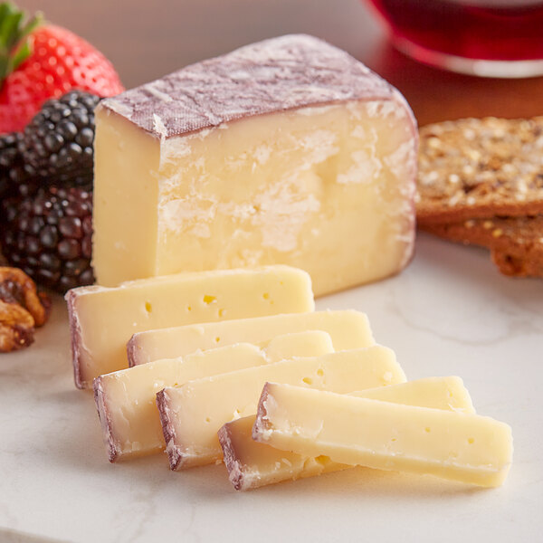 Sartori Merlot BellaVitano Cheese 5.3 oz. Wedge - 12/Case