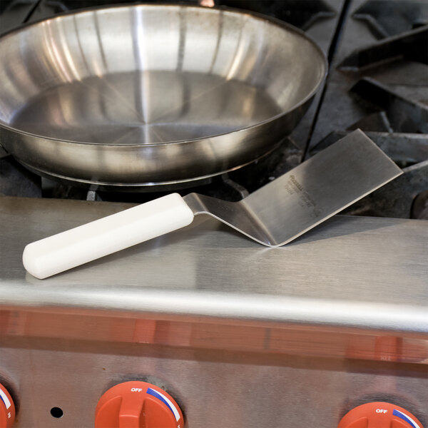 Dexter-Russell 31644 4" x 3" Solid Turner - Plastic Handle