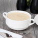 Tuxton AMU-044 Modena AlumaTux Pearl White (European White) 10.5 oz. Stackable China Soup Cup ...