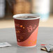 Choice 10 oz. Coffee Print Poly Paper Hot Cup - 50/Pack
