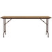Correll 24" x 96" Medium Oak Light Duty Melamine Folding Table