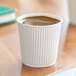 Choice 4 oz. Sleeveless Ripple Wall White Paper Hot Cup - 25/Pack