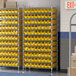 Regency 12" x 36" x 74" Wire Shelving Unit with 88 Yellow Bins